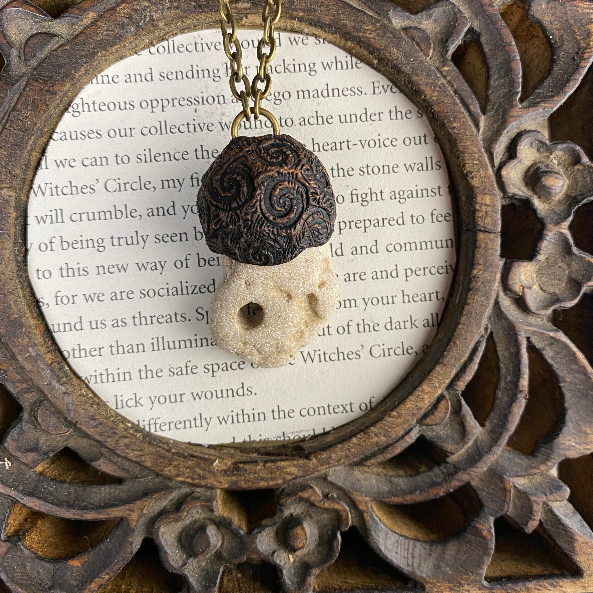 Hag Stone Talisman Necklace with a Spiral Pattern